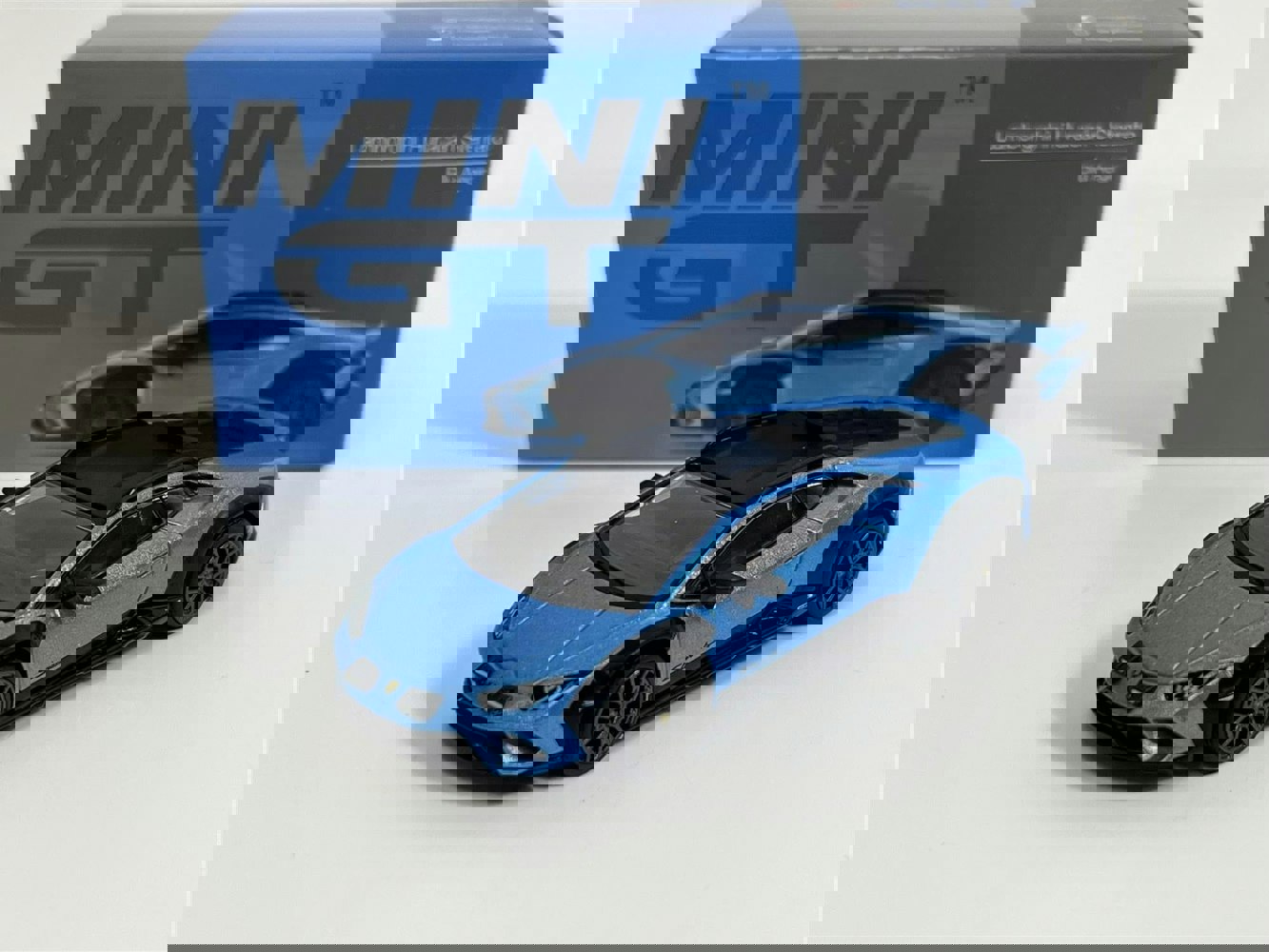 Mini GT Lamborghini Huracan Sterrato Blue Aegir LHD | Rackhams