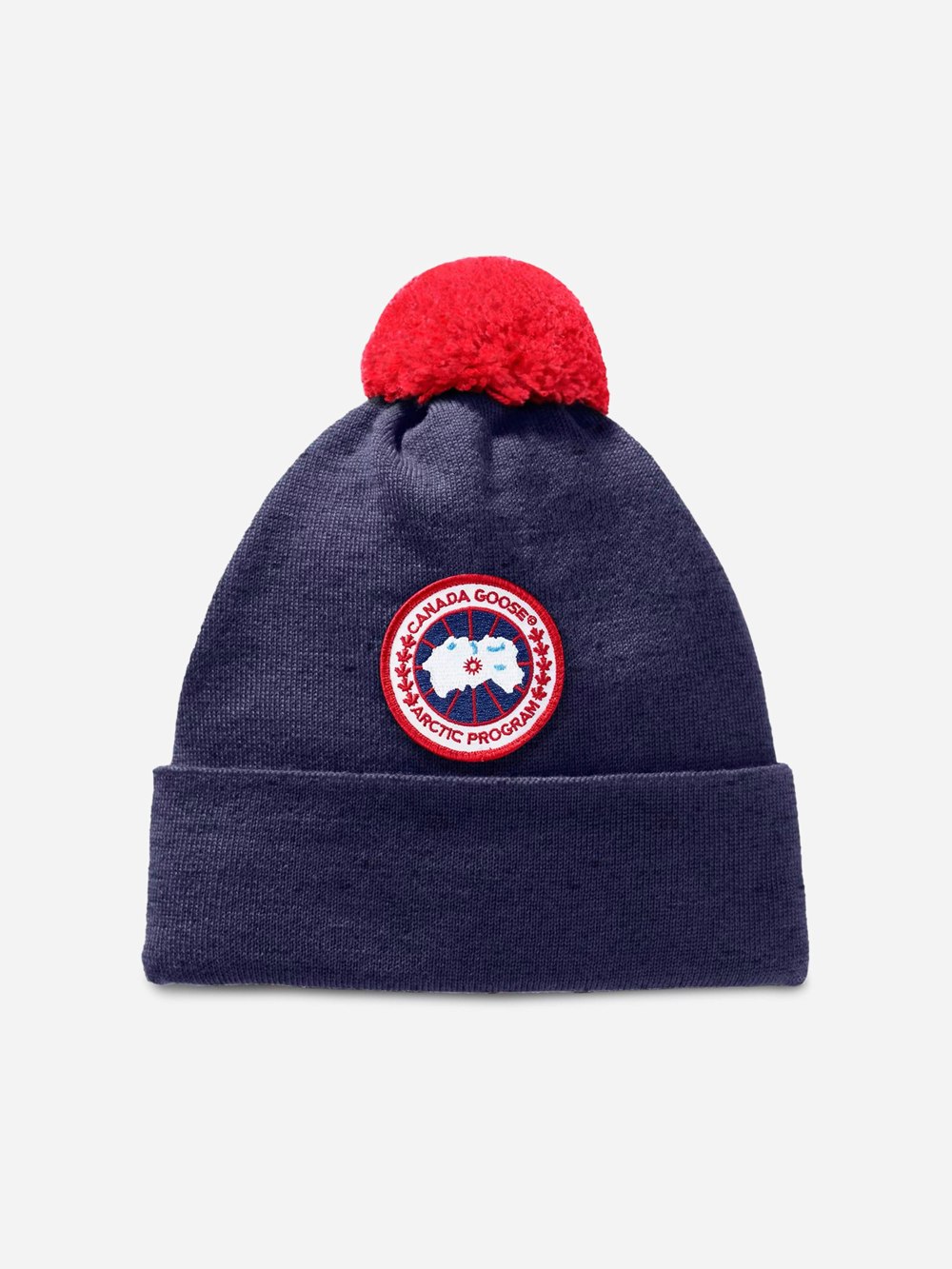 Canada Goose Kids Pom Toque Hat in Navy | Rackhams