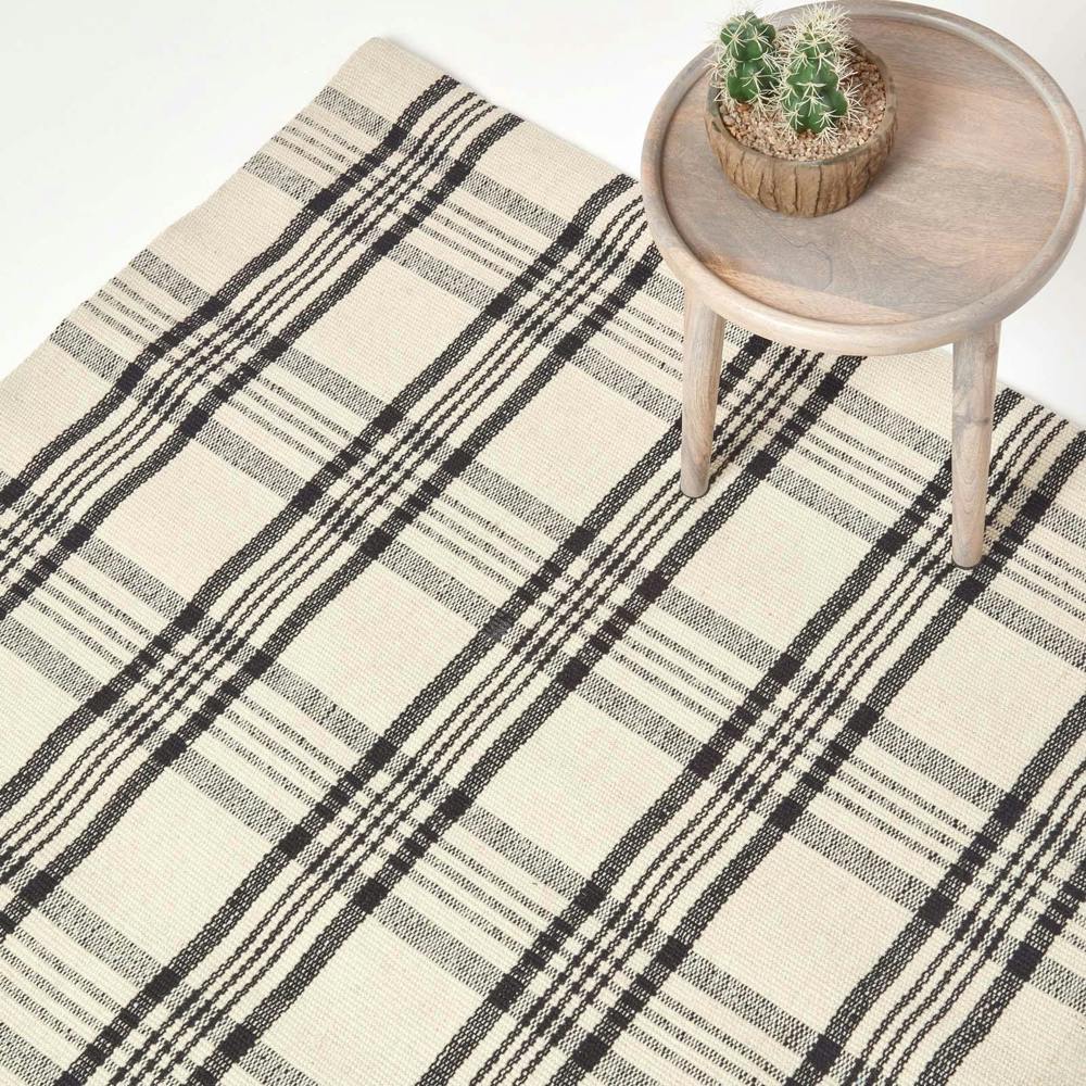 HOMESCAPES Logan Black and White Tartan Check Non-Slip | Rackhams