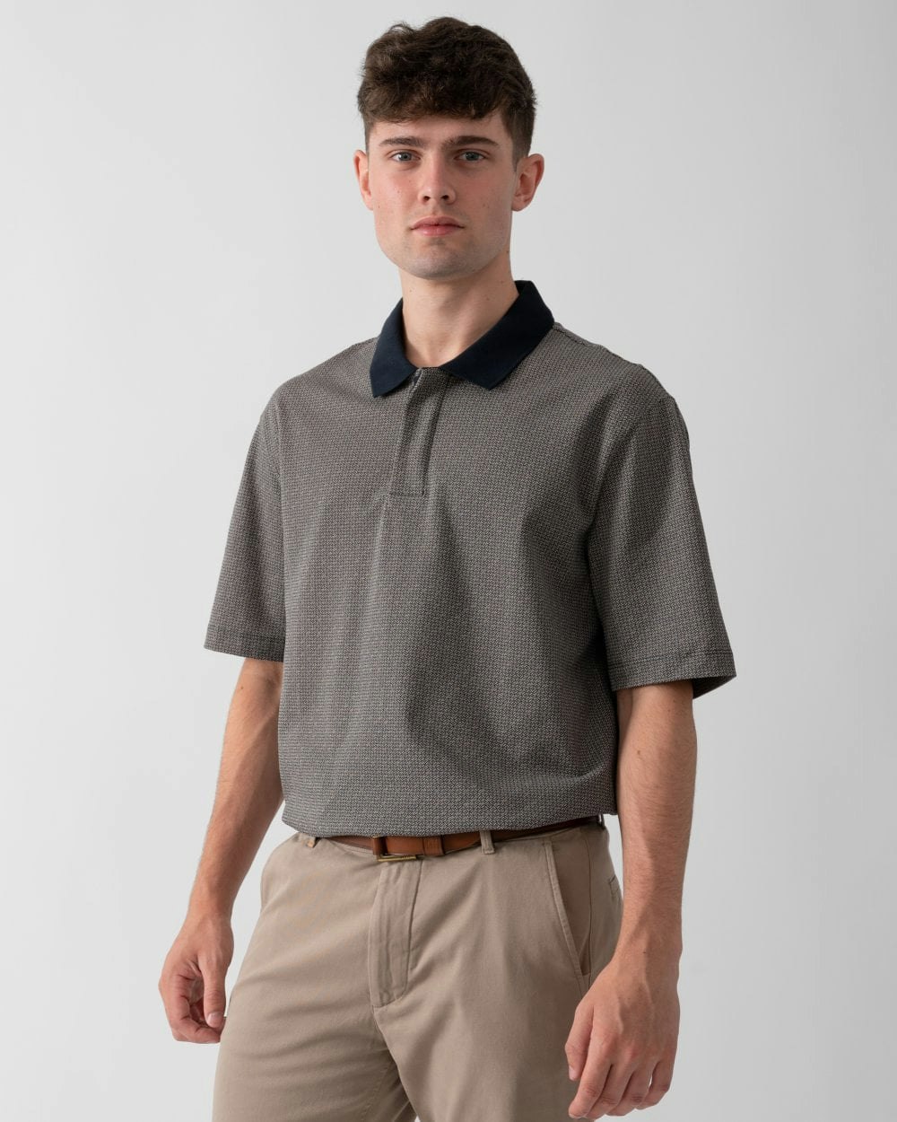 Armani Exchange Mens AOP Logo Pattern Polo Shirt | Rackhams